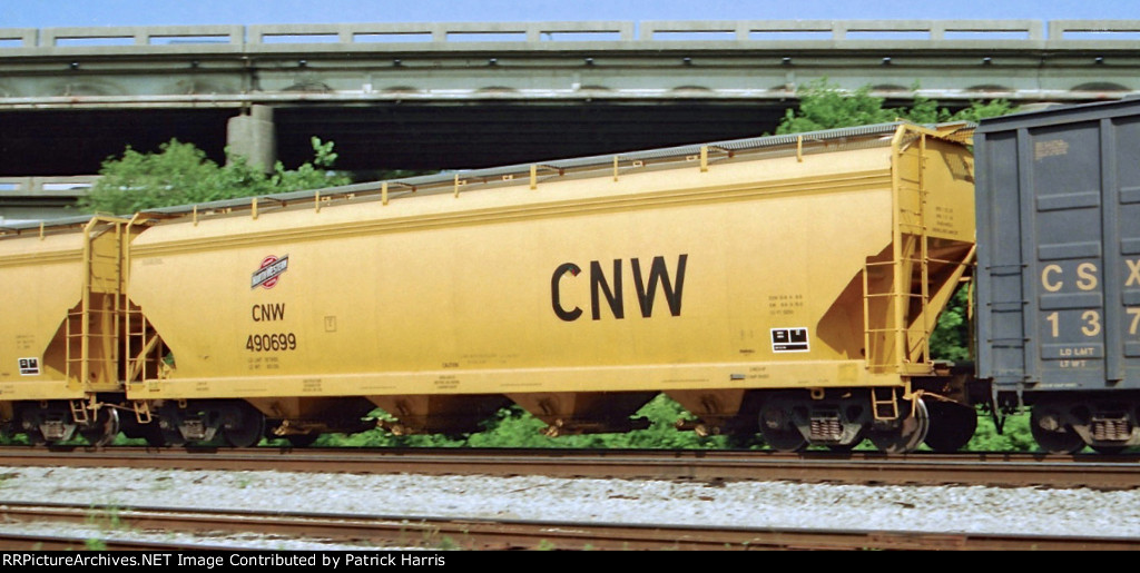 CNW 490699 Thrall 4-bay centerflow westbound on CSX to SP Avondale Yard under the Franklin ...
